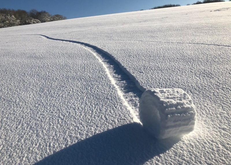 Rare snow rollers spotted in field near Marlborough - BBC News