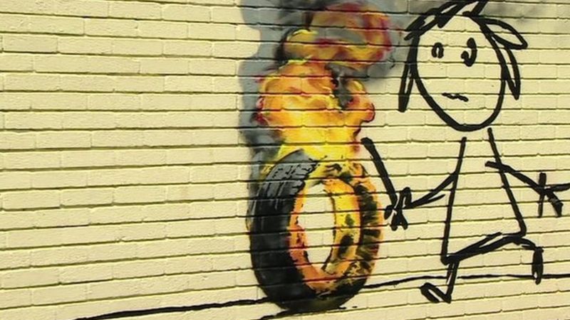 Banksy decorates West Bank hotel with views of Israel's wall - BBC News