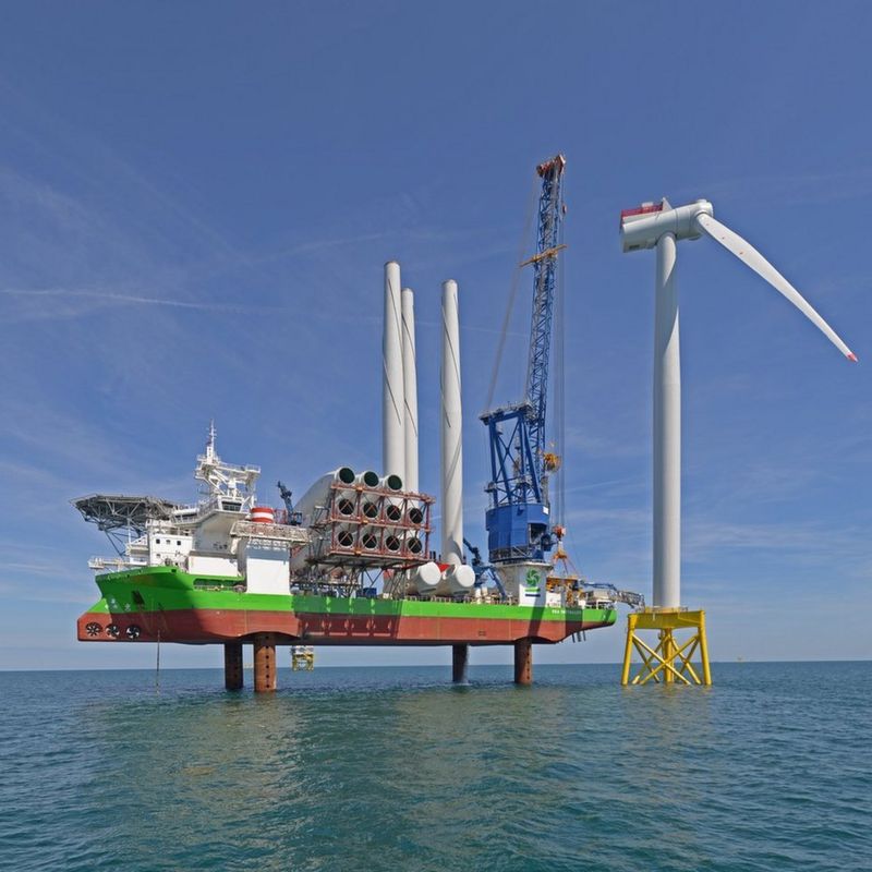 North Sea wind farms: First turbines fitted on East Anglia One - BBC News