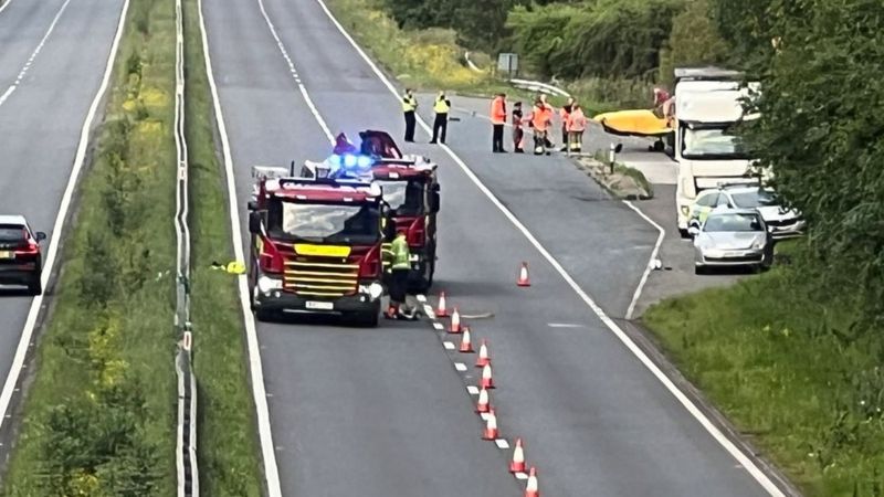 Light aircraft makes emergency landing on A40 near Cheltenham - BBC News