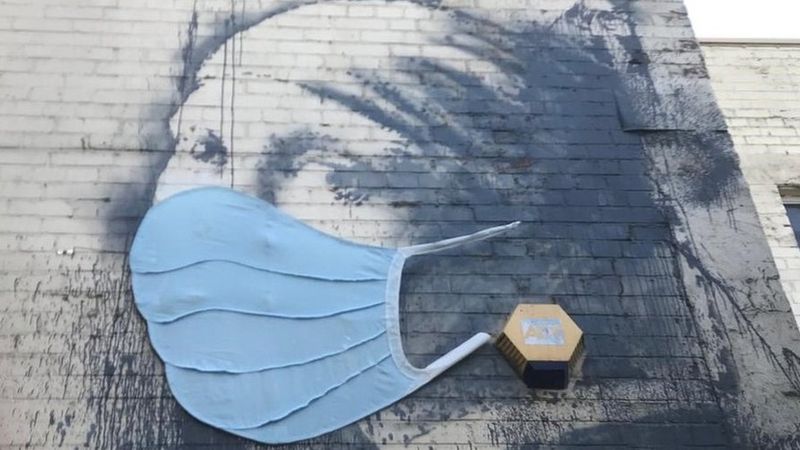 Coronavirus: Banksy's Girl with a Pierced Eardrum given face mask - BBC ...