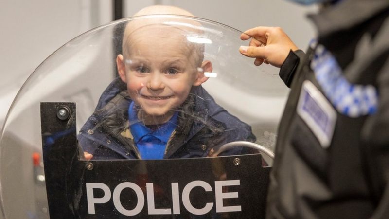 Ethan Adams: Boy fighting cancer made honorary police cadet - BBC News