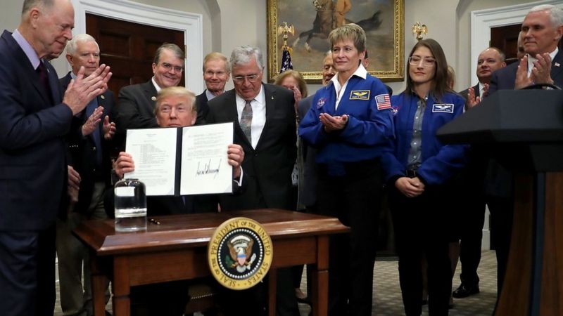 Donald Trump signs directive to send astronauts back to Moon - BBC News