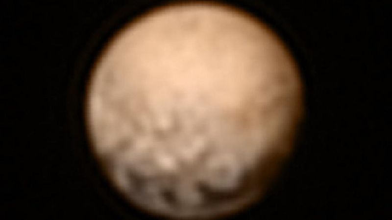 New Horizons: Nasa spacecraft speeds past Pluto - BBC News