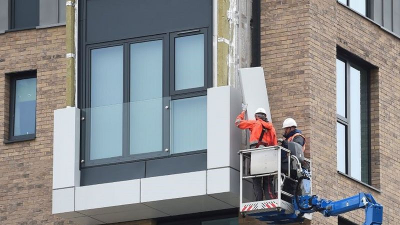 Housebuilders told to remove unsafe cladding on low buildings - BBC News