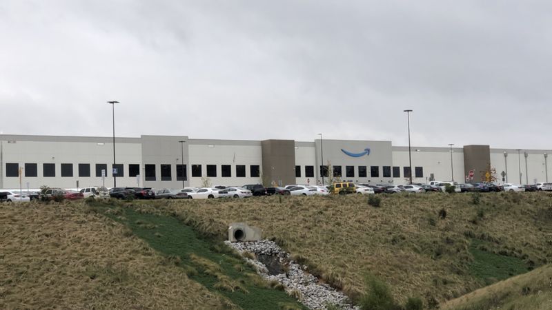 Amazon fight with workers: 'You're a cog in the system' - BBC News