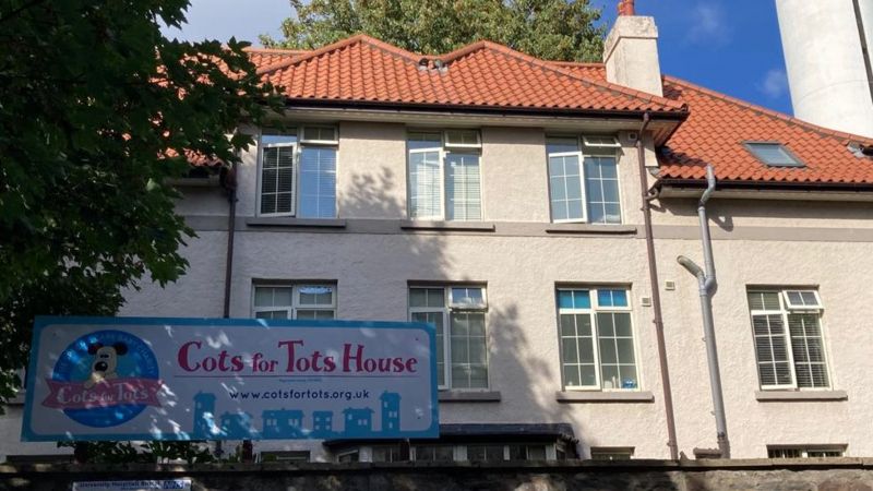 Cots for Tots: The house where 'community and love is forged' - BBC News