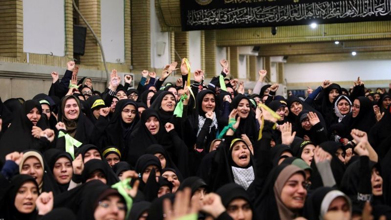 Woman becomes face of Iran protests despite not being there - BBC News