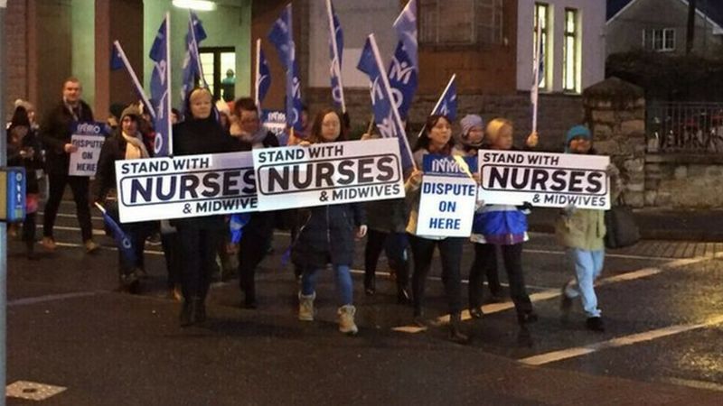 Irish nurses go on 24-hour strike over pay dispute - BBC News