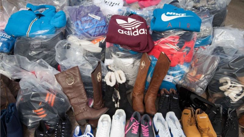 Fake clothes seized in Torfaen donated to Ghana village - BBC News
