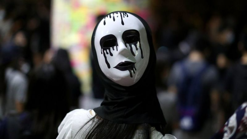 In pictures: The face masks Hong Kong wants to ban - BBC News