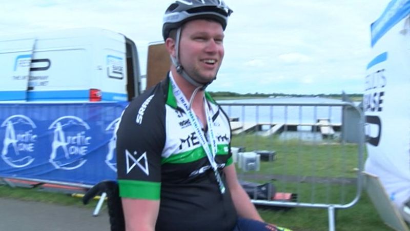 Amputee Thames Valley PC completes triathlon - BBC News