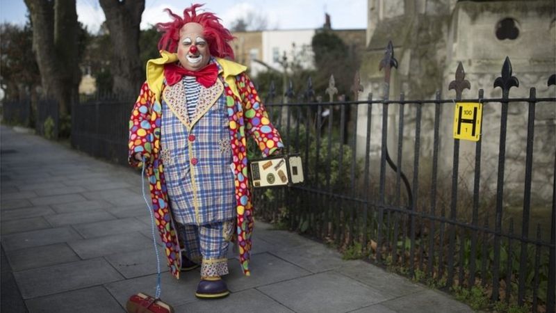 London clown congregation marks 70th circus celebration - BBC News