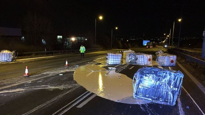 HGV crash spills 12,000 litres of paint on M606 motorway - BBC News