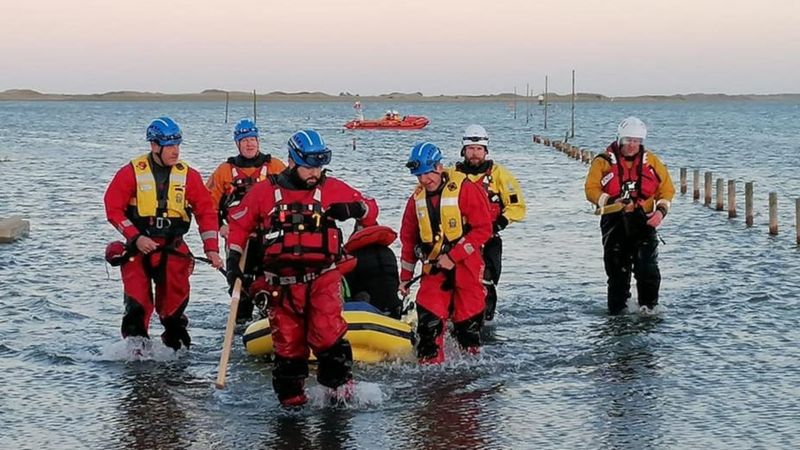Holy Island: Trapped children and adult rescued from causeway - BBC News