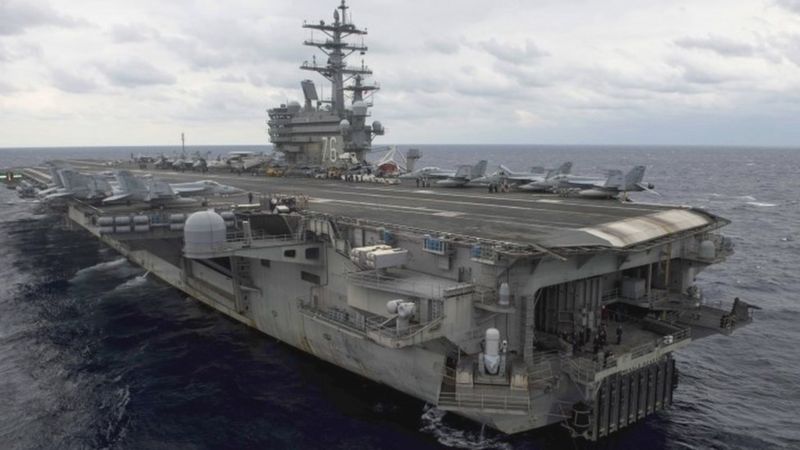 US Navy aircraft crash: Eight rescued off Japanese coast - BBC News