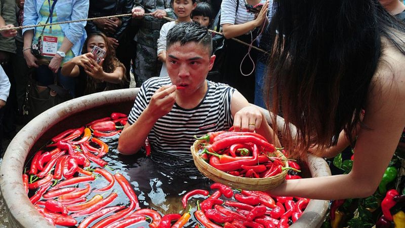 Why do people enjoy taking part in chilli-eating contests? - BBC News