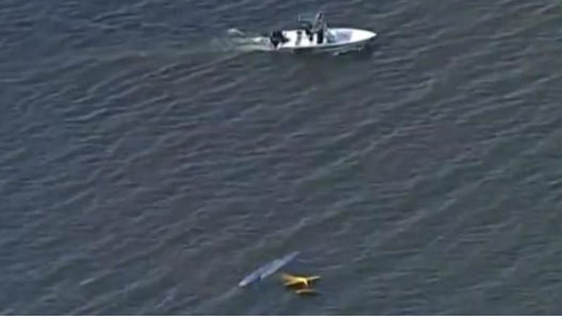 Two small planes collide in mid-air over Florida lake, four dead - BBC News