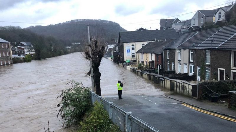In pictures: Storm Dennis brings flooding to Wales - BBC News