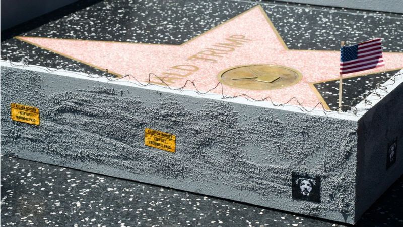 US election: Artist builds wall around Trump's Hollywood star - BBC News