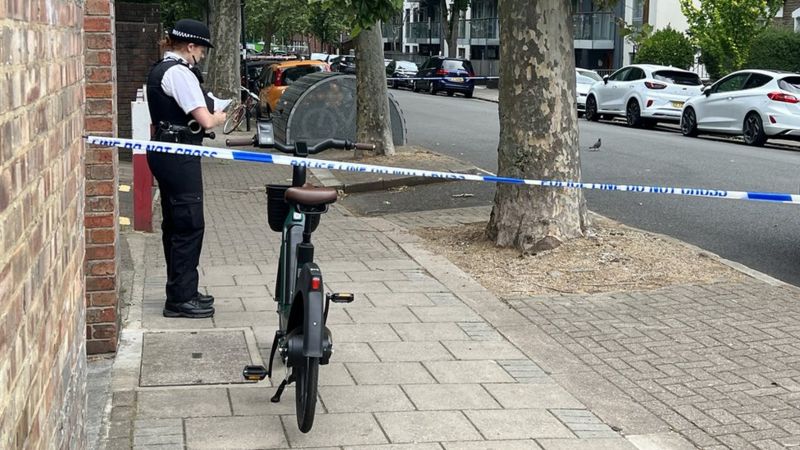 Boy, 15, and man stabbed to death in north London - BBC News