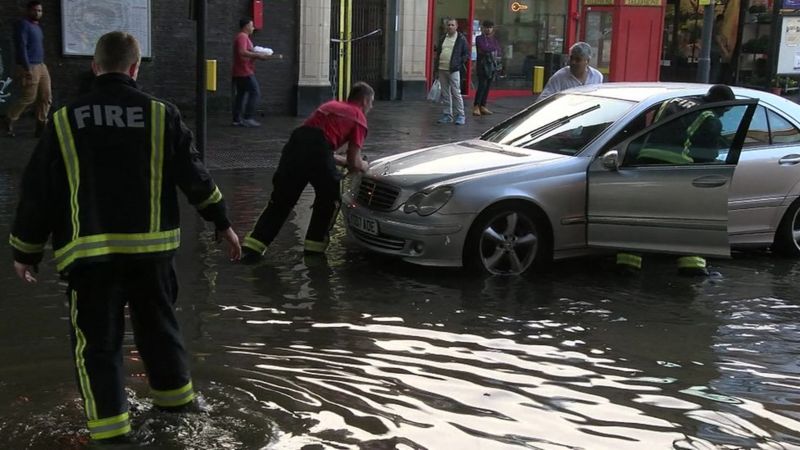 Children rescued as flash floods hit parts of UK - BBC News