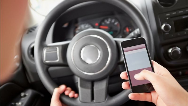 Hands-free phone use by drivers 'equally distracting' - BBC News
