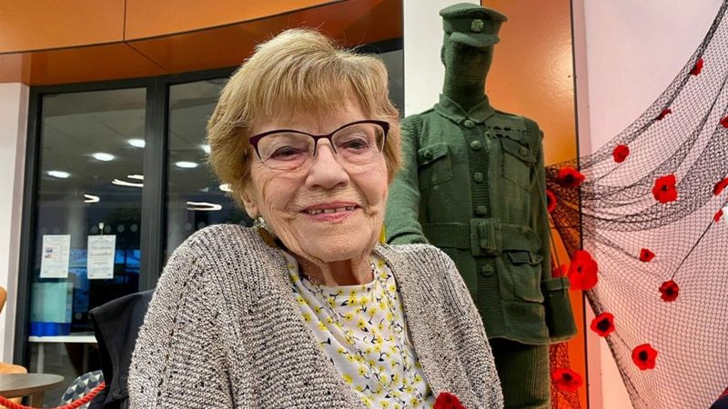 Life-sized remembrance soldier created by knitters - BBC News