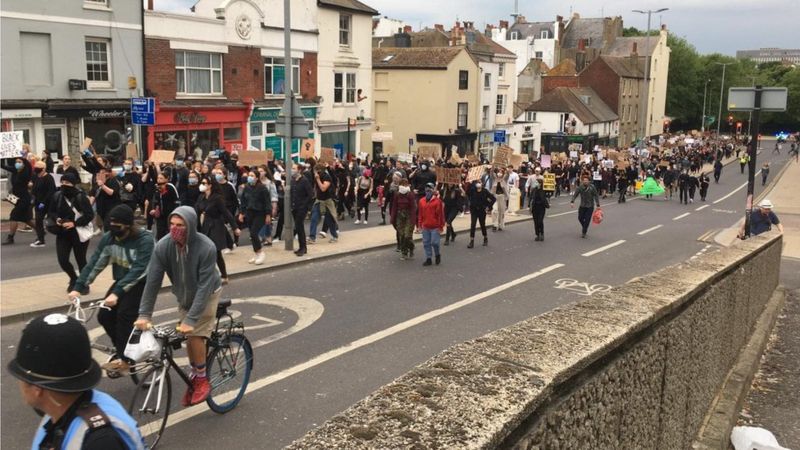 Brighton George Floyd protesters march to police station - BBC News