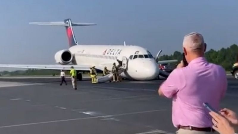 Delta flight lands safely in Charlotte without front landing gear - BBC ...