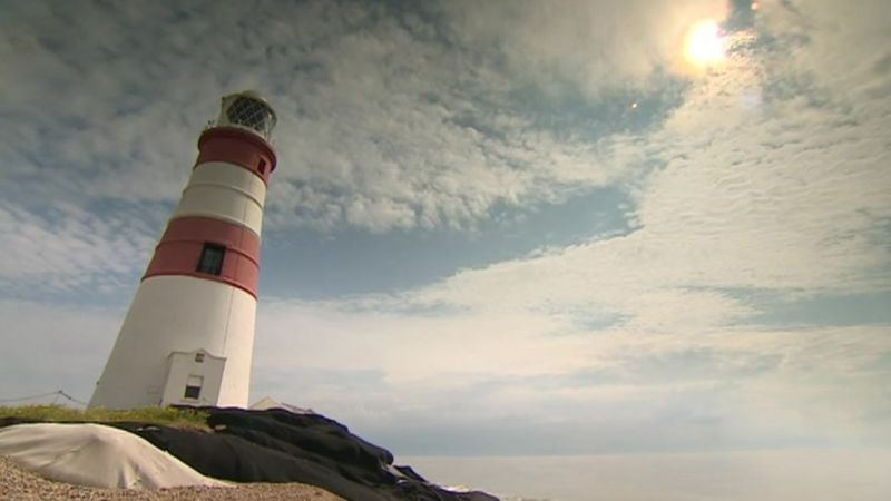 Orfordness Lighthouse: Waving goodbye to a coastal landmark - BBC News