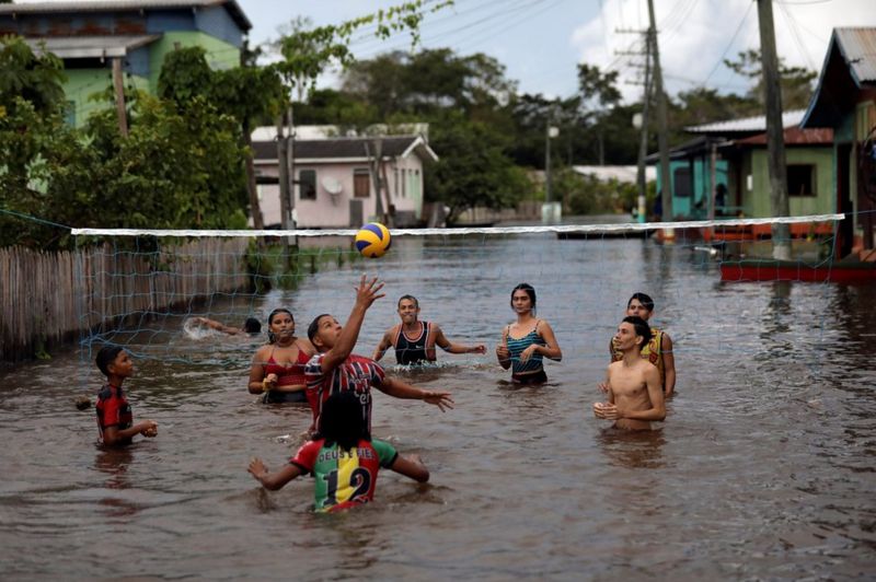 In pictures: Rising Amazon rivers flood Covid-hit areas in Brazil - BBC ...