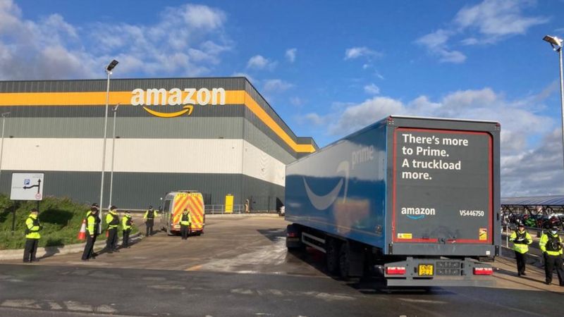 Amazon protests: 31 arrested as Extinction Rebellion targets retailer ...