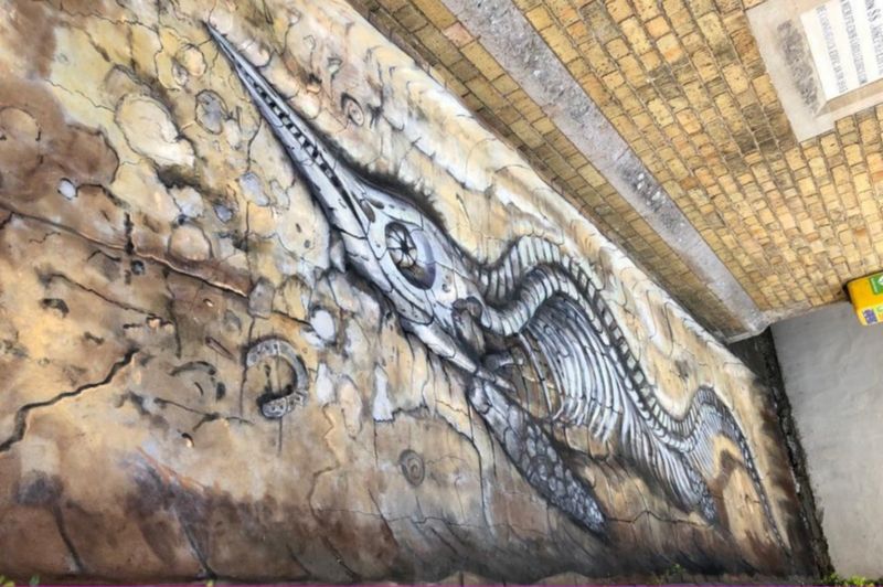 Rutland 'sea dragon' recreated as 3D pavement illusion - BBC News