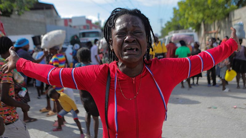Haiti police riot after crime gangs kill 14 officers - BBC News