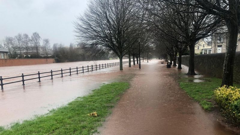 Wales flooding: Roads blocked and homes evacuated - BBC News