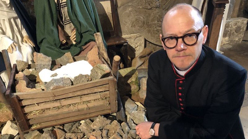 Tewkesbury Abbey's rubble nativity scene highlights children affected ...