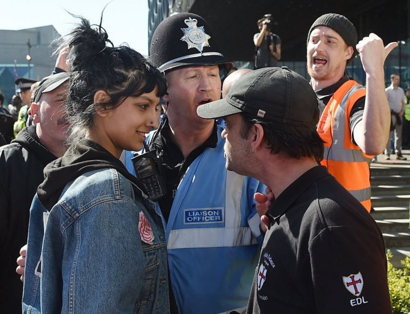 EDL Birmingham protest photo woman 'surprised' by viral reaction - BBC News