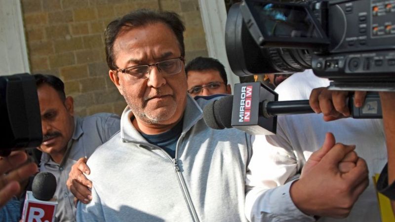 Yes Bank: Founder Rana Kapoor held over alleged money laundering - BBC News