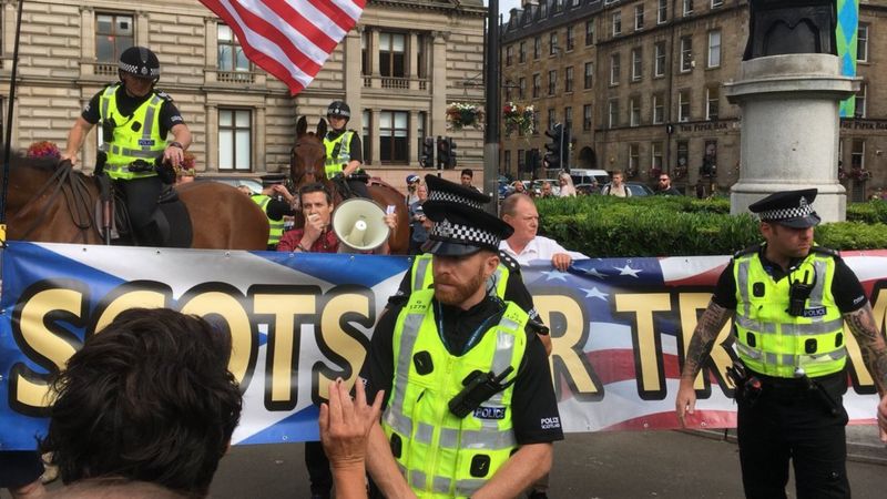 Trump arrives in Scotland amid protests - BBC News