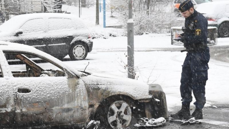 Sweden probes riot in mainly immigrant Stockholm suburb - BBC News