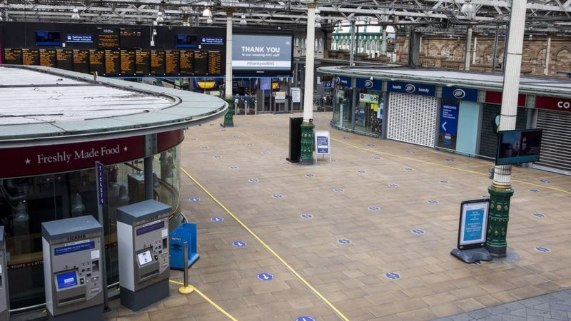 Coronavirus: Train stations put crowd-control measures in place - BBC News