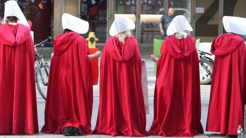 How the handmaid became an international protest symbol - BBC News