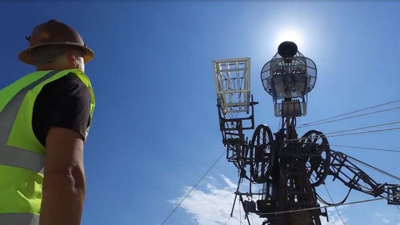 Giant miner puppet walks through Cornwall - BBC News