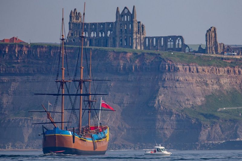 Captain Cook's Endeavour replica comes 'home' to Whitby - BBC News