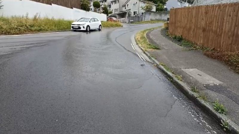 Leak to be fixed after water 'gushes' down road in Plymouth - BBC News