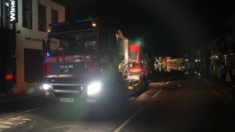 Flooding: Work begins to clear Downpatrick floodwater - BBC News