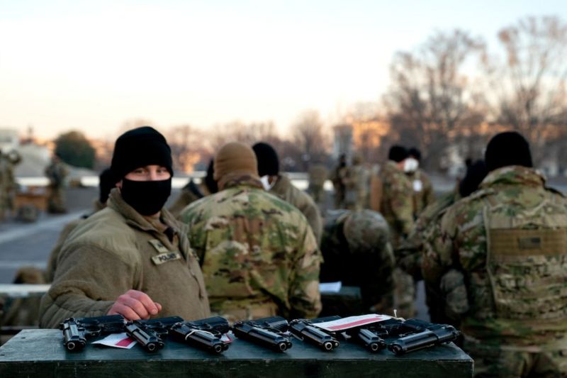In pictures: Troops guard US Capitol, one week after riots - BBC News