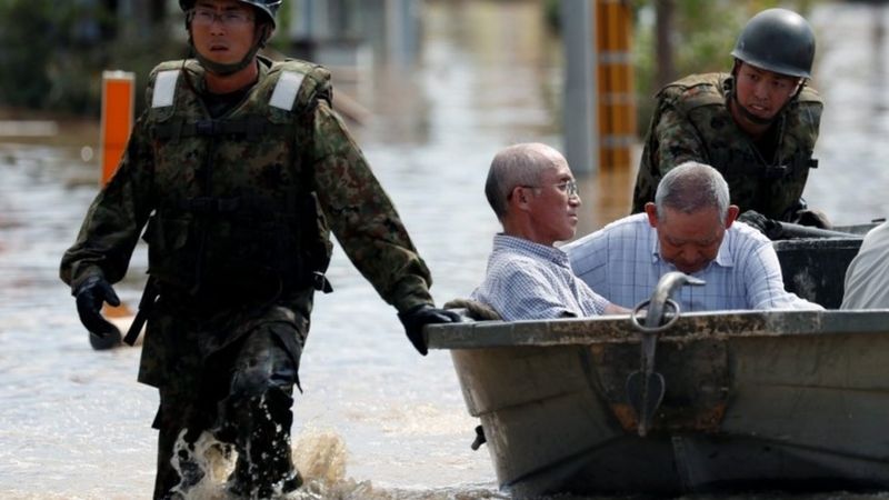 Japan floods: At least 100 dead after record rainfall - BBC News