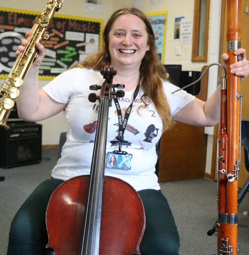 Music teacher takes nine exams on nine instruments in one day - BBC News